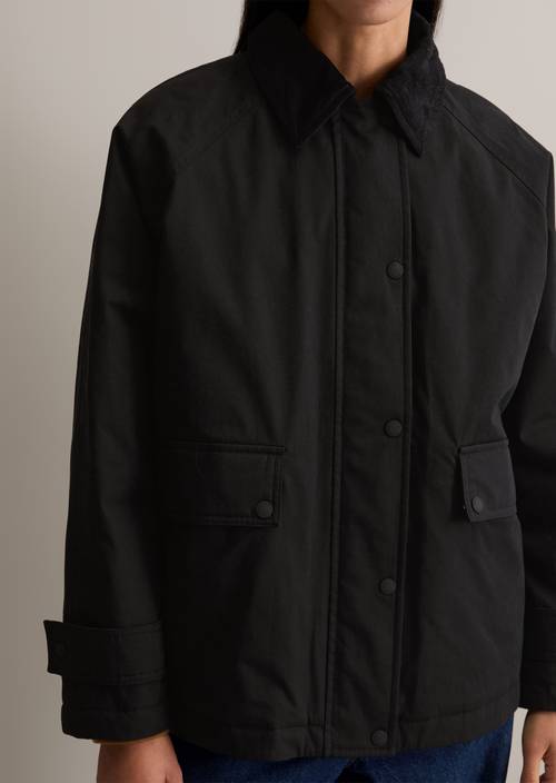Oversize padded barn jacket made from a waxed organic cotton-nylon mix ...