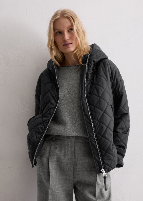 Chaqueta relajada acolchada con capucha de poliéster reciclado - negro ...